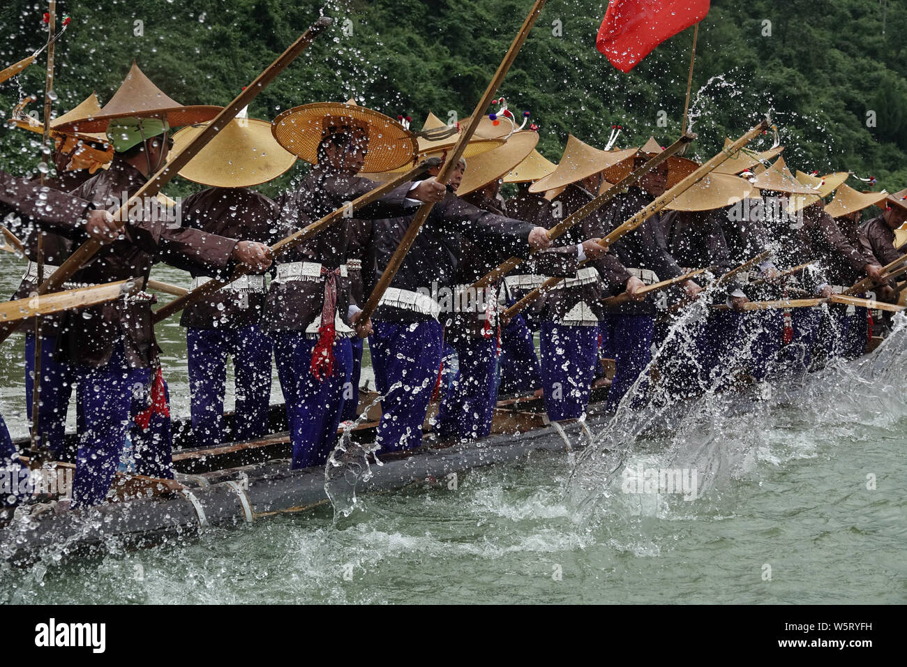 Chinese people of Miao ethnic minority take part in a dragon race ...