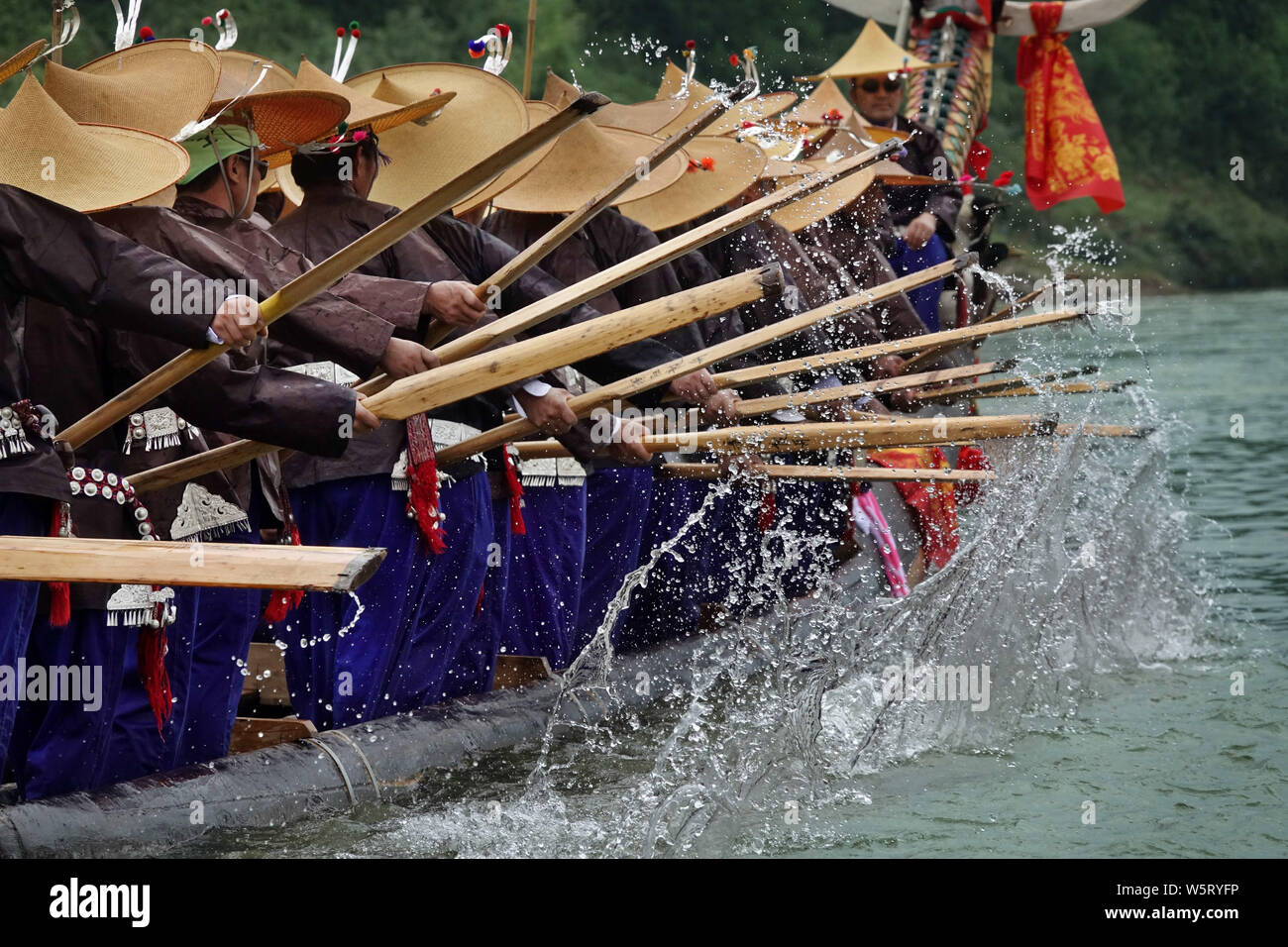 Chinese people of Miao ethnic minority take part in a dragon race ...
