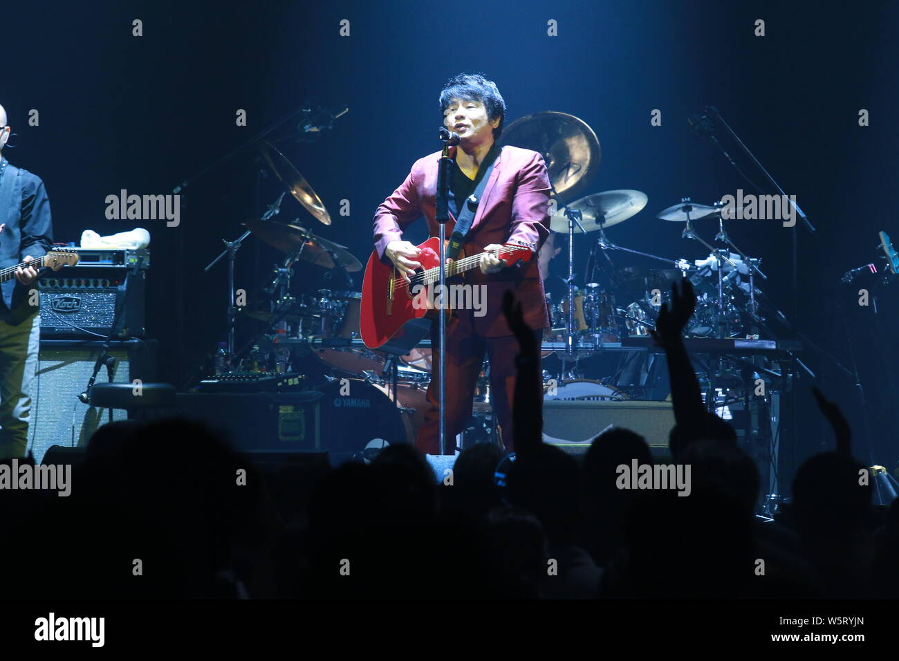 Japanese singer-songwriter Aska performs during the ASKA Concert Tour ...