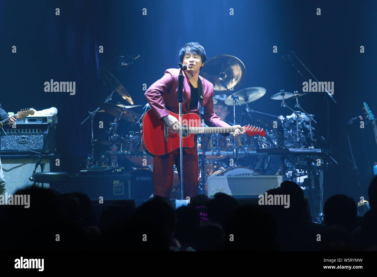 Japanese singer-songwriter Aska performs during the ASKA Concert Tour ...