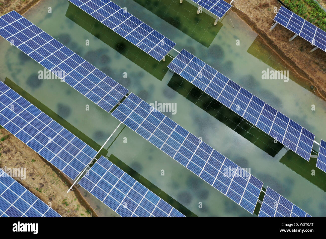 --FILE--Aerial view of a floating solar energy farm at a photovoltaic ...