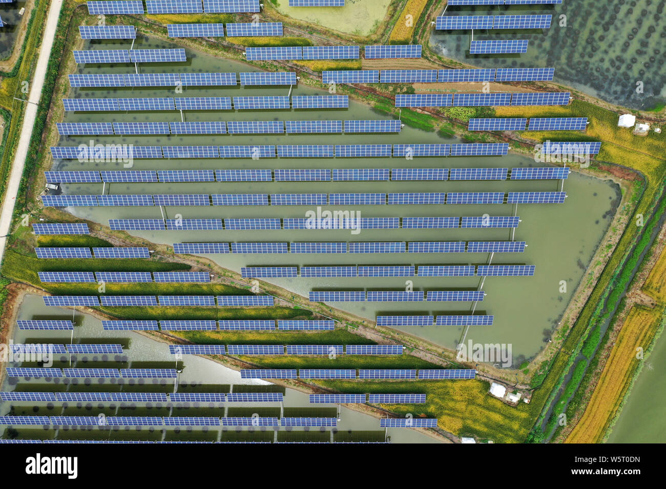 --FILE--Aerial view of a floating solar energy farm at a photovoltaic ...