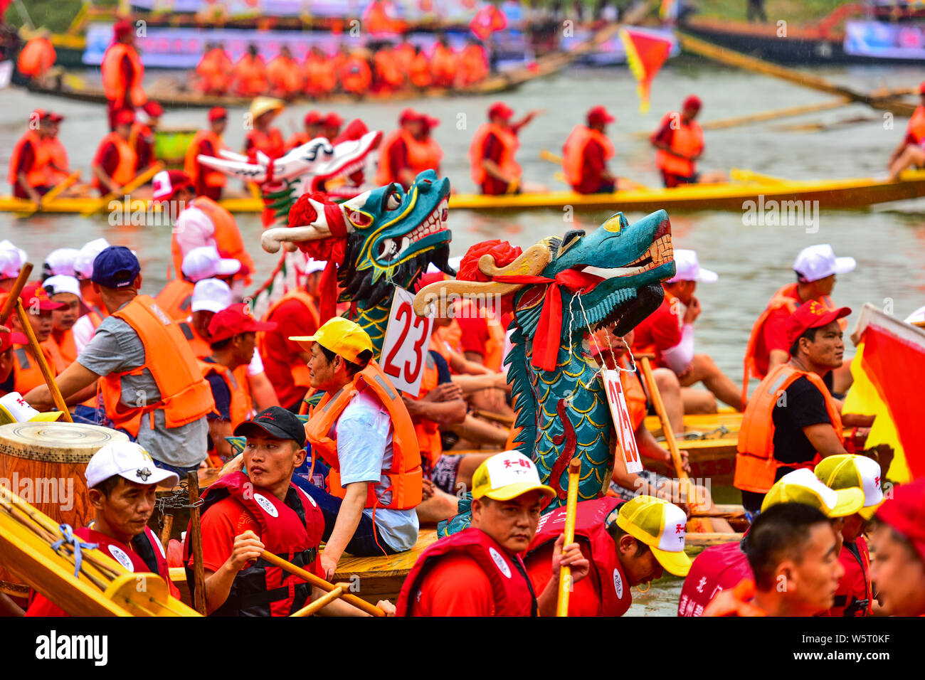 Competitors take part in a dragon boat race to celebrate the Chinese ...