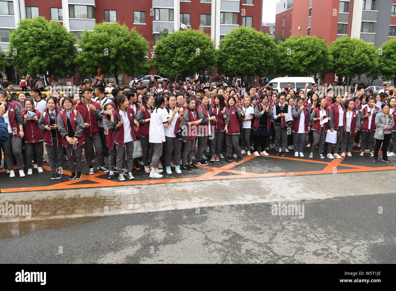 Chinese students attend a worship ceremony for Confucius to pray for ...