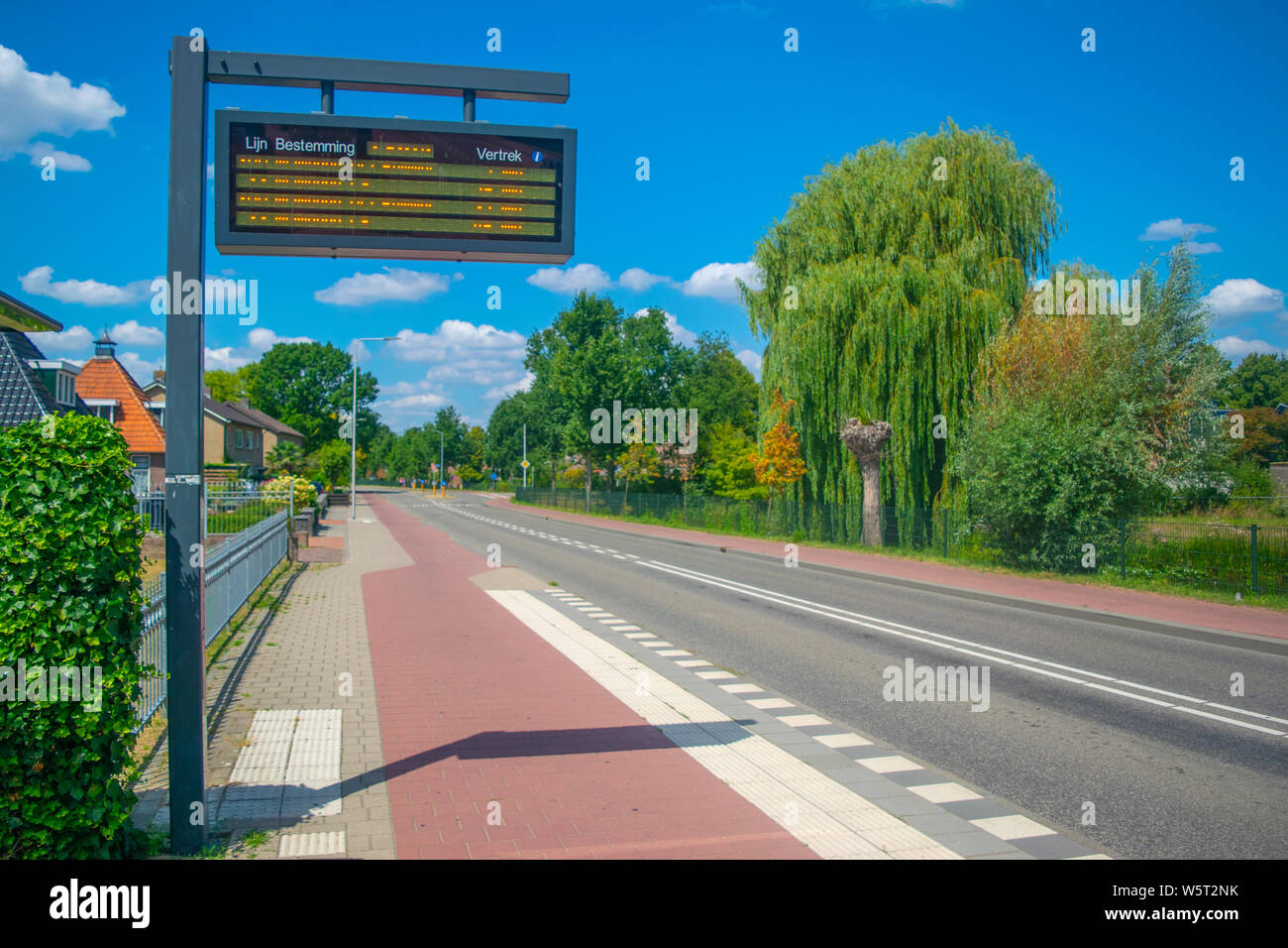 Information panel with Dutch bus departure times,electronic bulletin ...