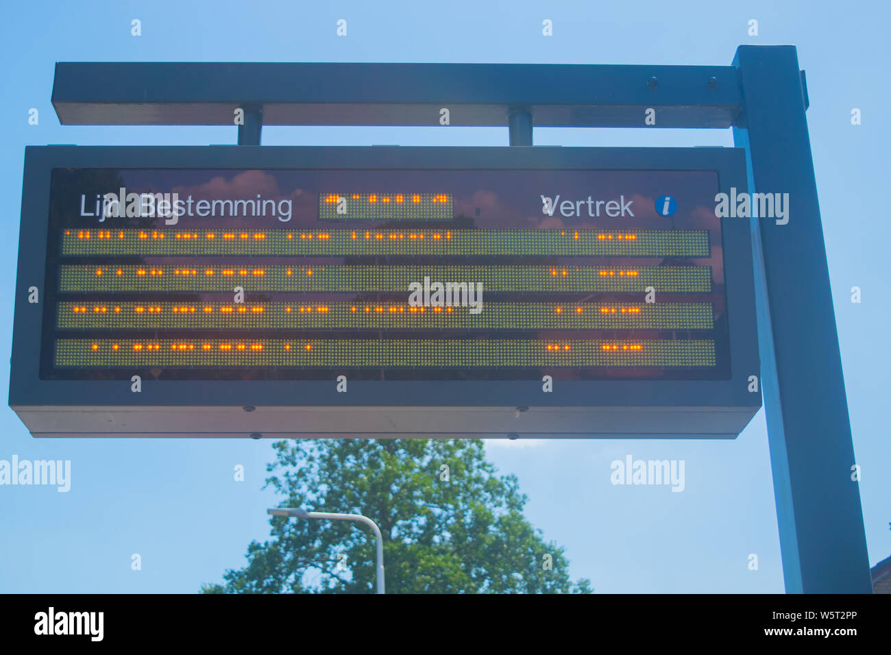 Information panel with Dutch bus departure times,electronic bulletin ...