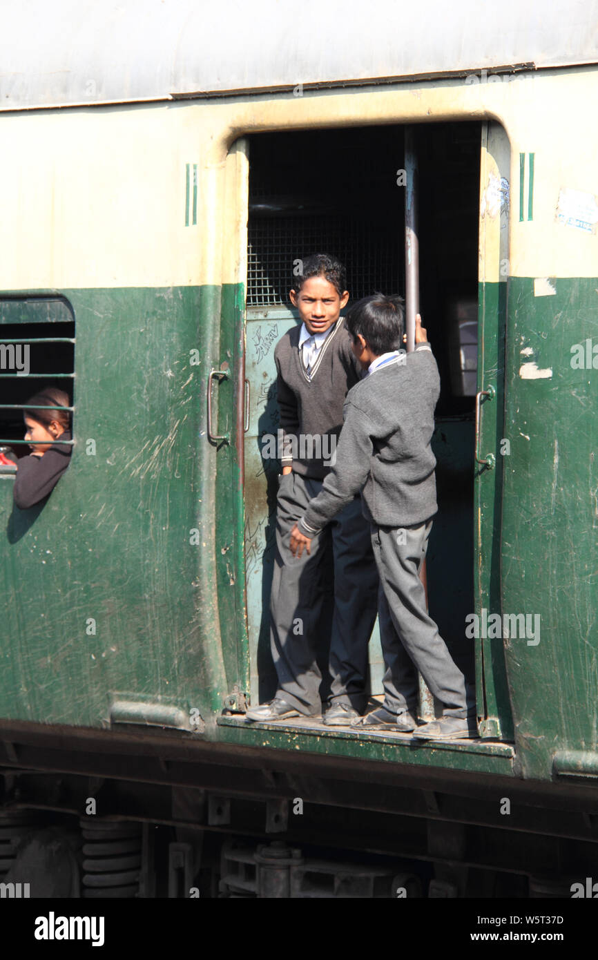 School children traveling in a local train Stock Photo - Alamy