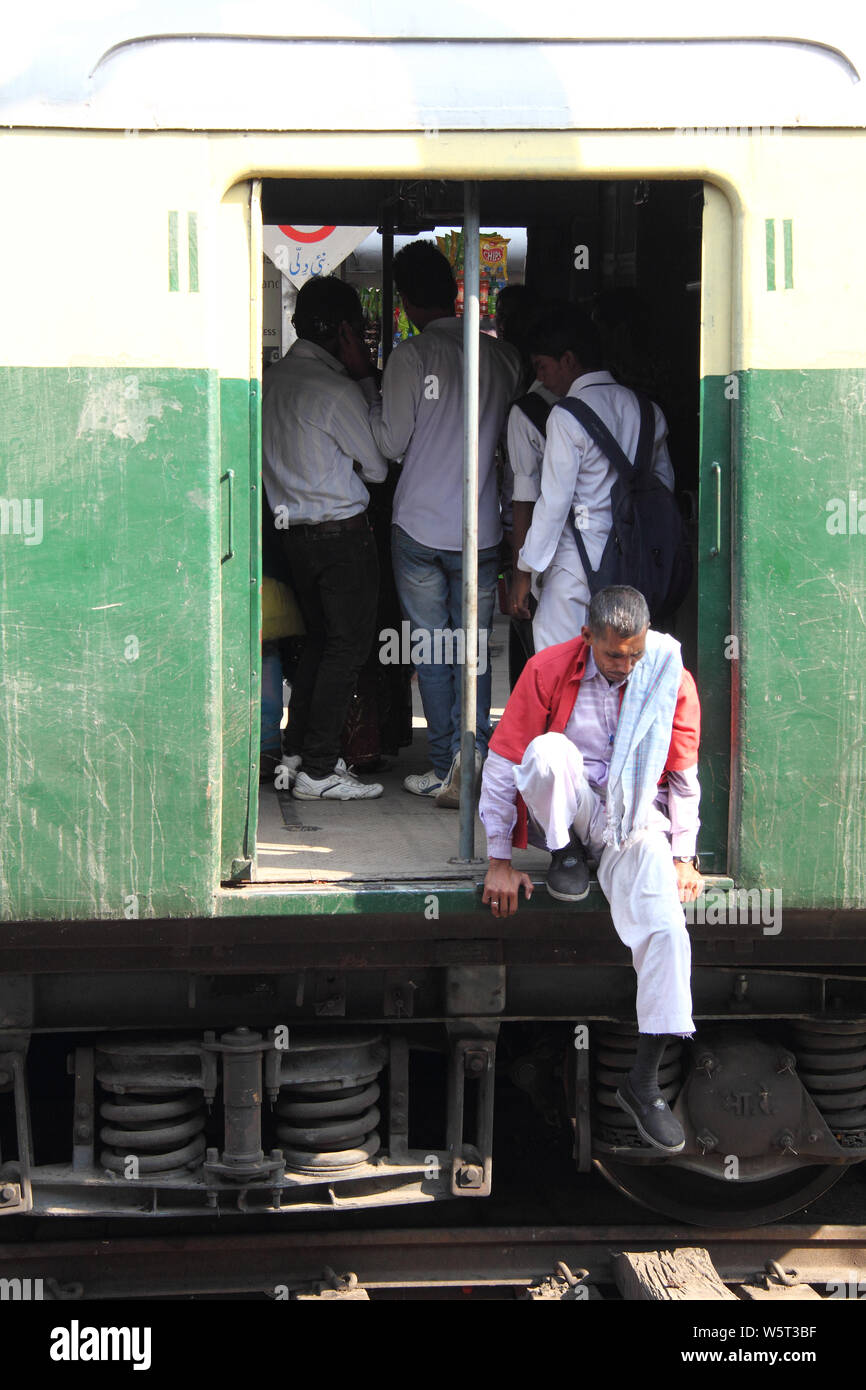 Passengers getting out from a train Stock Photo - Alamy