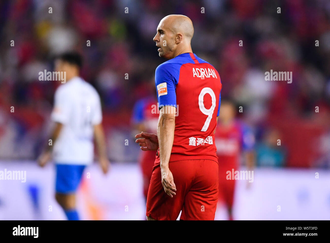 Polish football player Adrian Mierzejewski of Chongqing SWM reacts as ...
