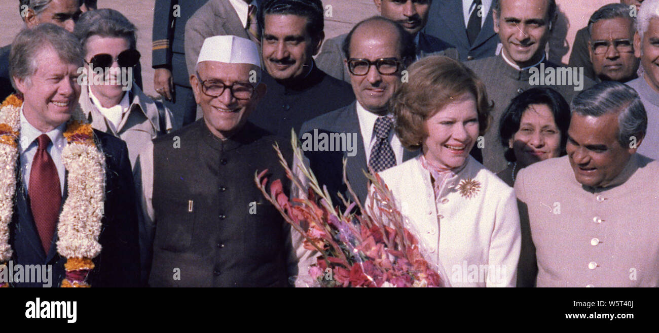 Officials of India welcome Jimmy Carter and Rosalynn Carter during an ...