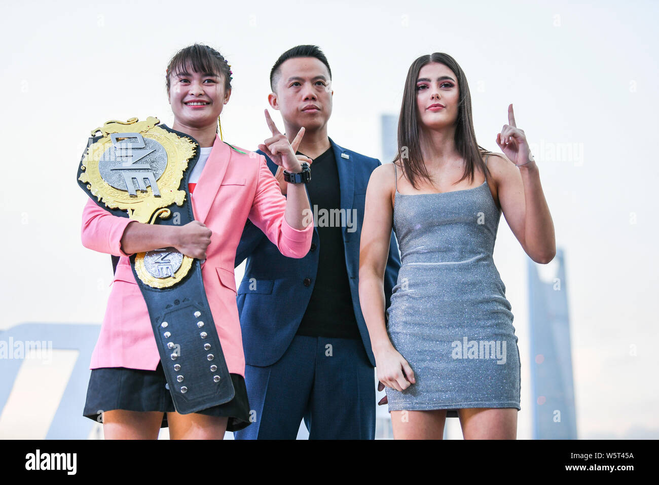 Alma Juniku, right, of Australia, and Stamp Fairtex of Thailand attend ...
