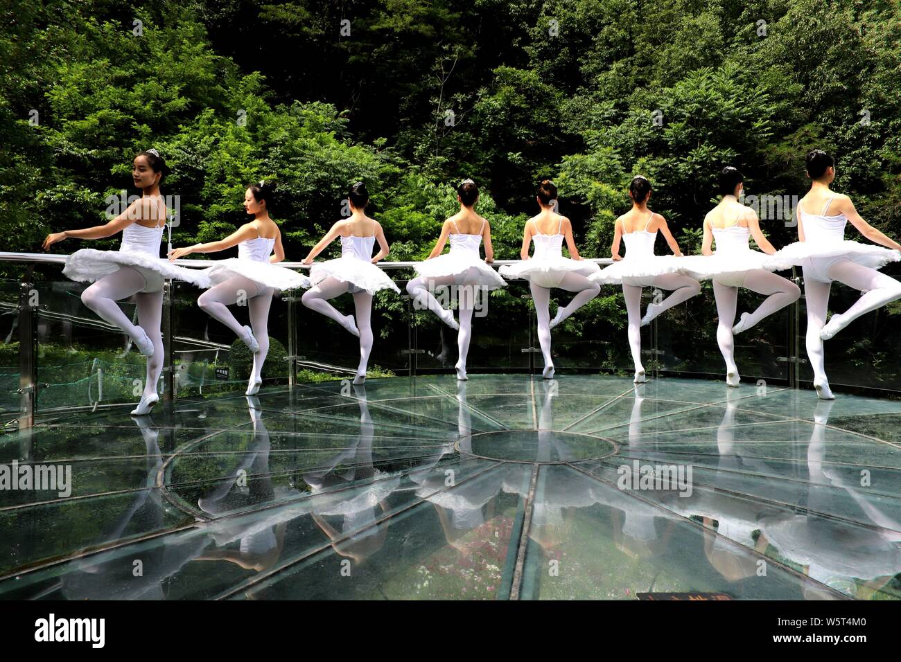 Chinese girls perform ballet in a karst cave as part of the opening ...