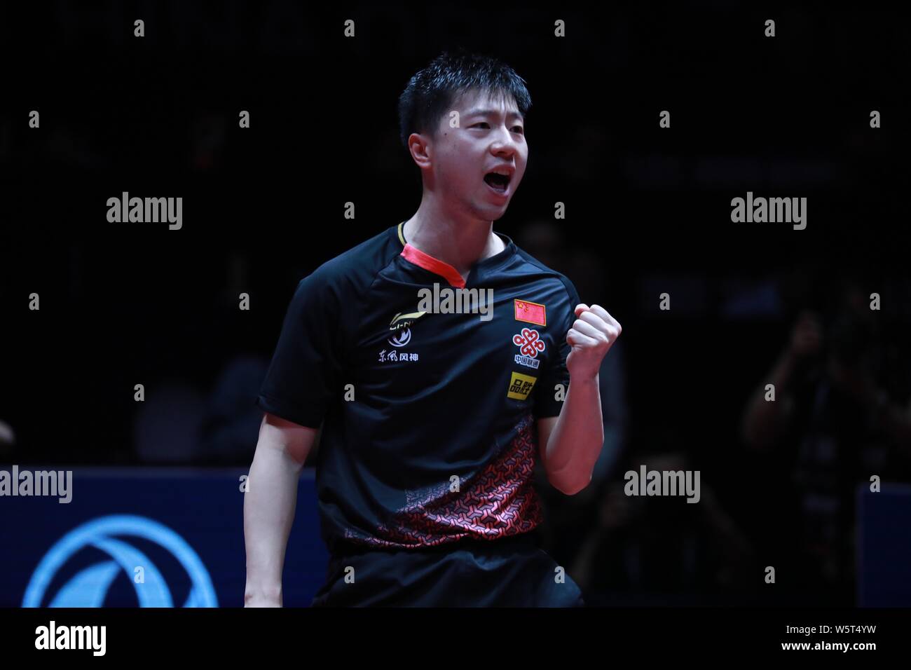 Ma Long of China celebrates after scoring against Tomokazu Harimoto of ...