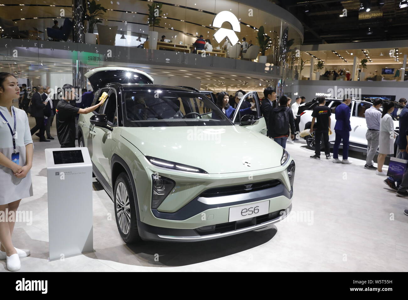 --FILE--People visit the stand of NIO during the 18th Shanghai ...