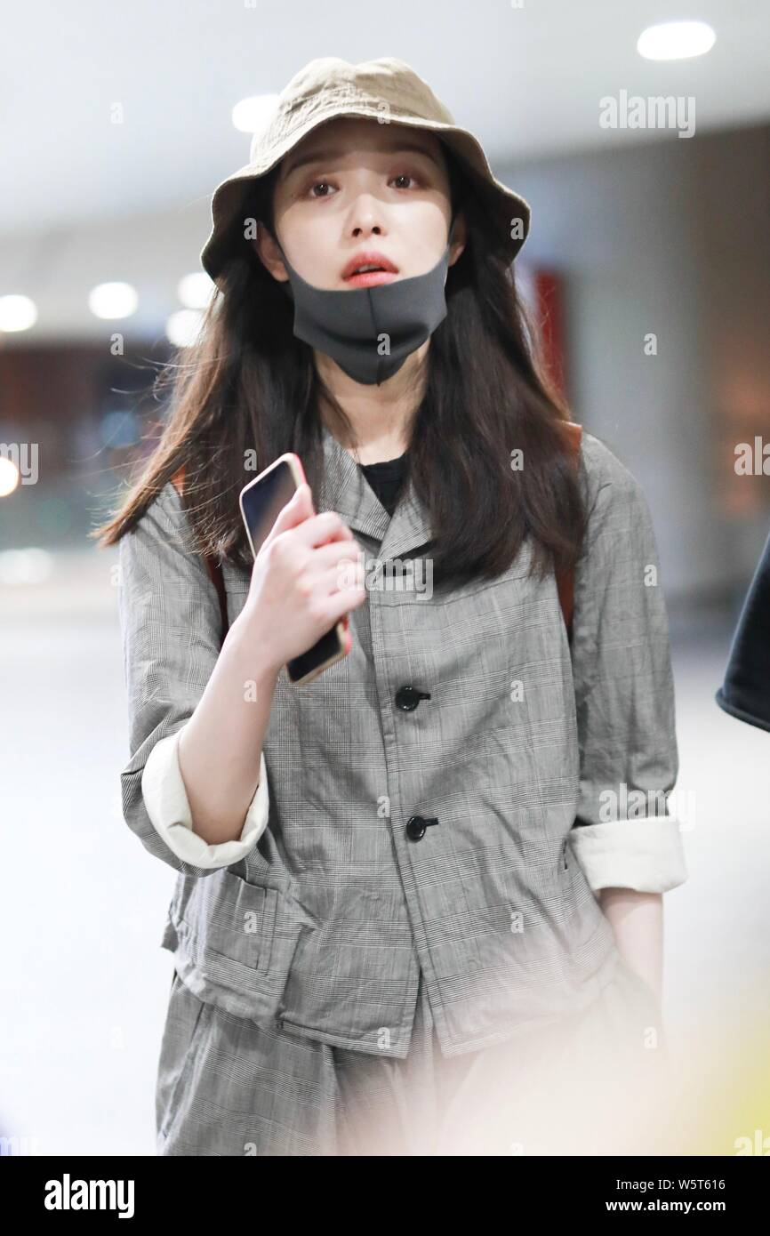 Chinese actress Ni Ni arrives at the Shanghai Hongqiao International ...