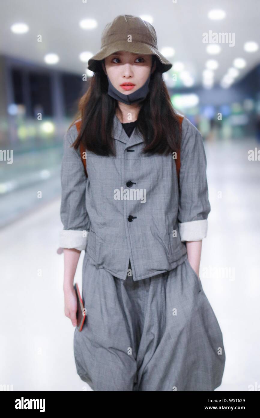 Chinese actress Ni Ni arrives at the Shanghai Hongqiao International ...