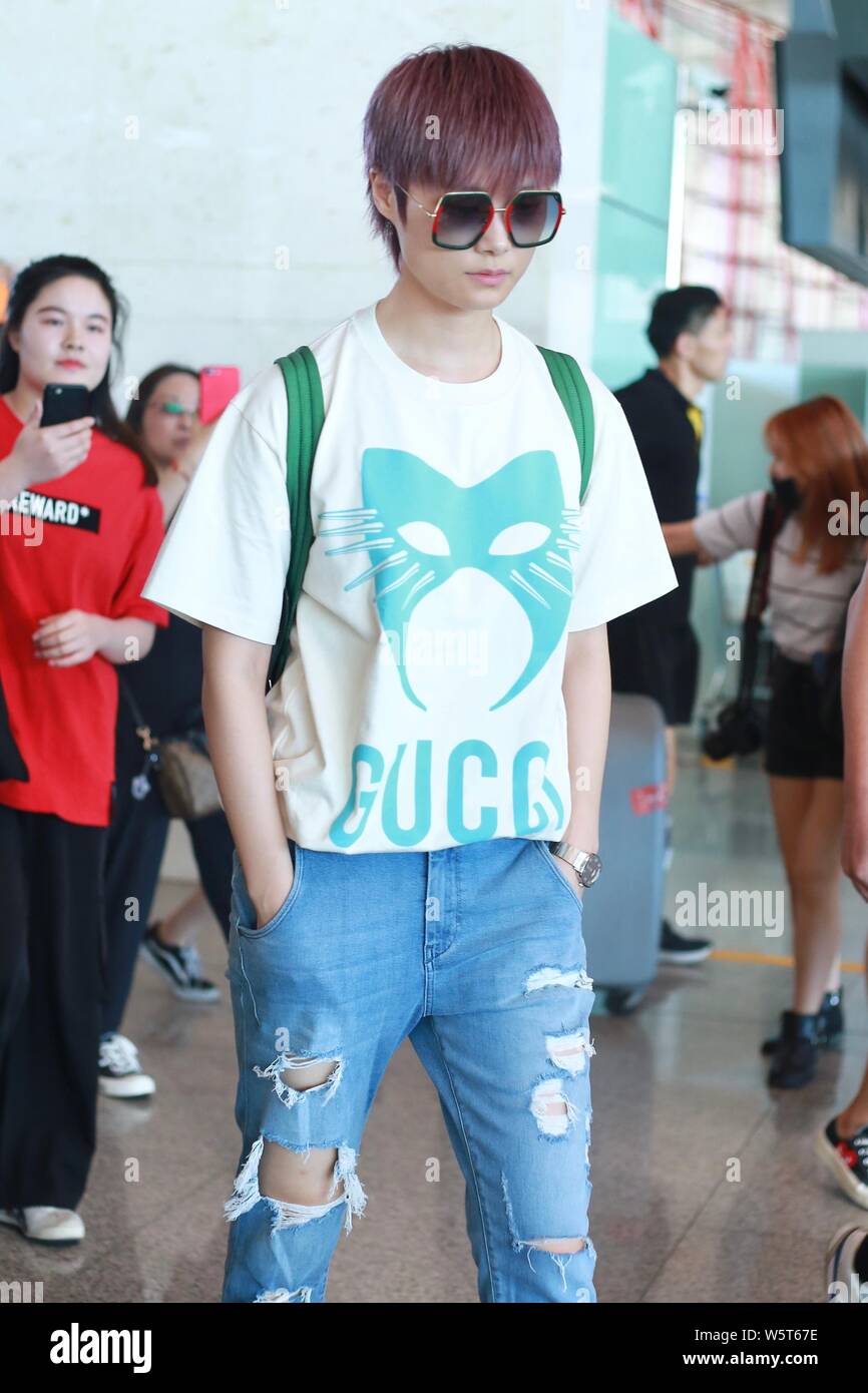 Chinese singer Chris Lee or Li Yuchun arrives at the Beijing Capital ...