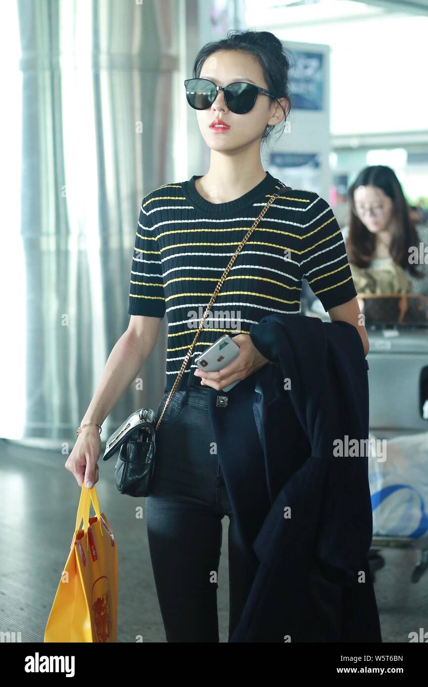 Chinese model and actress Zhang Yuxi arrives at the Beijing Capital ...