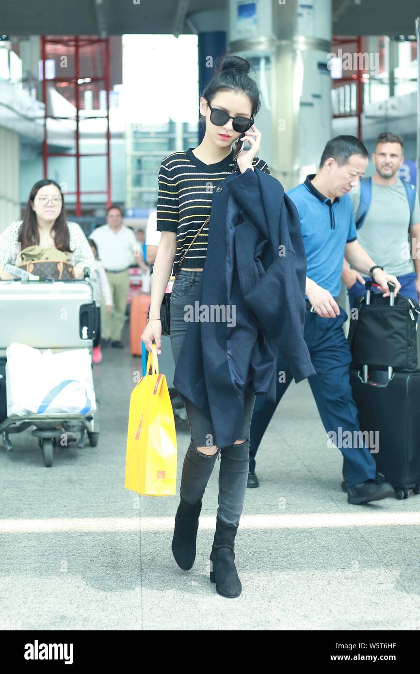Chinese model and actress Zhang Yuxi arrives at the Beijing Capital ...