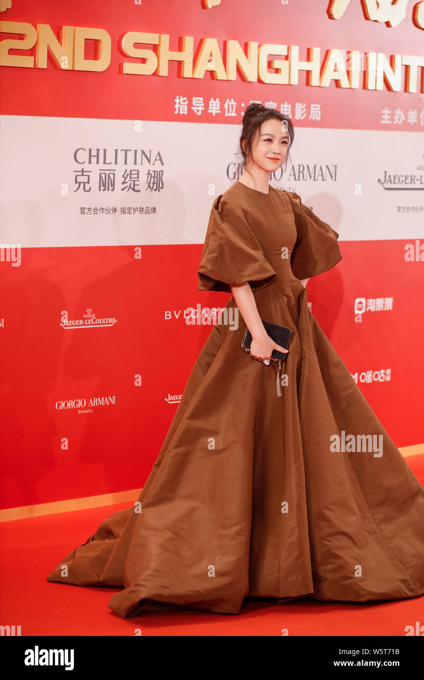 Chinese actress Tang Wei arrives on the red carpet for the opening ...