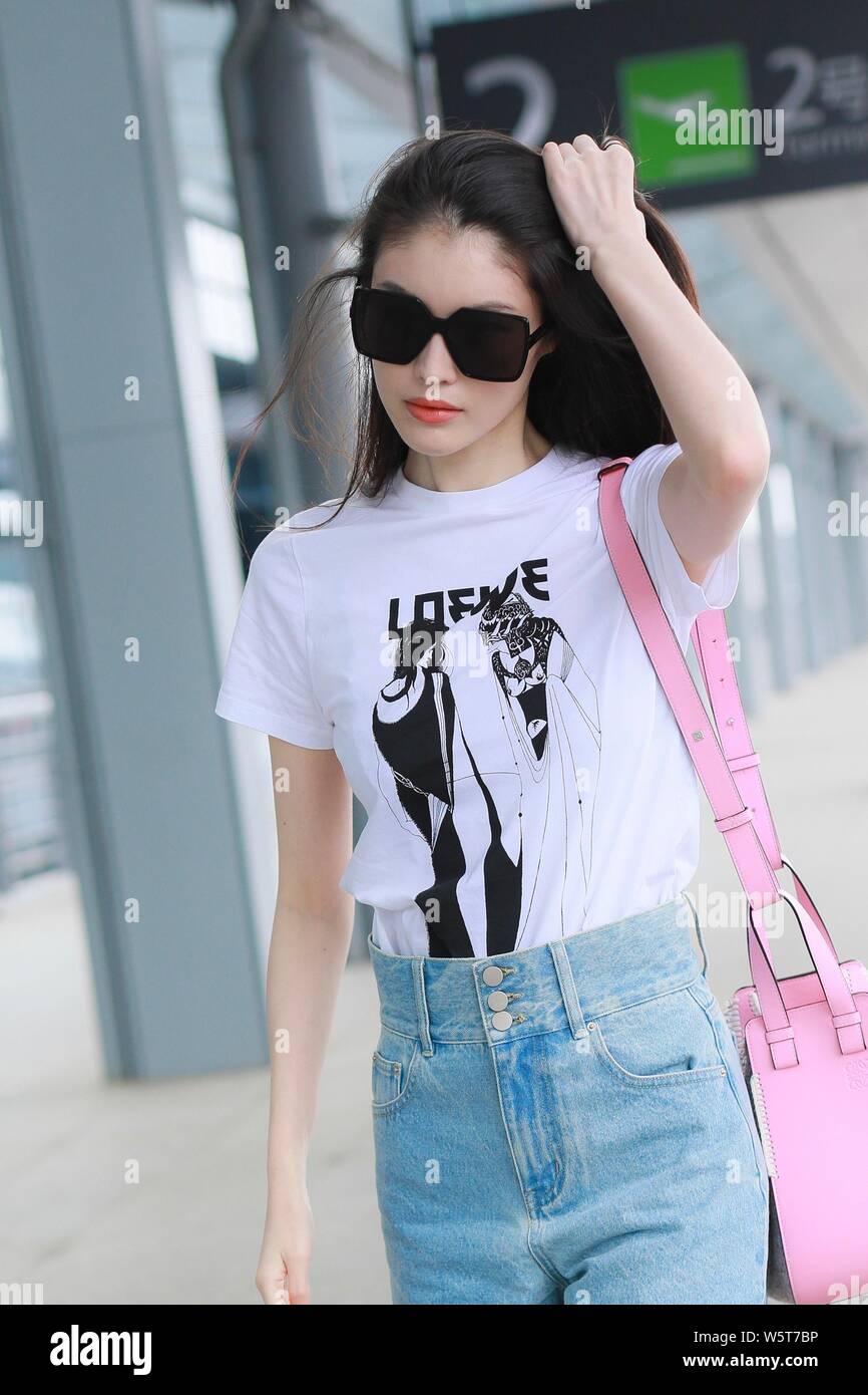 Chinese model He Sui arrives at the Shanghai Hongqiao International ...