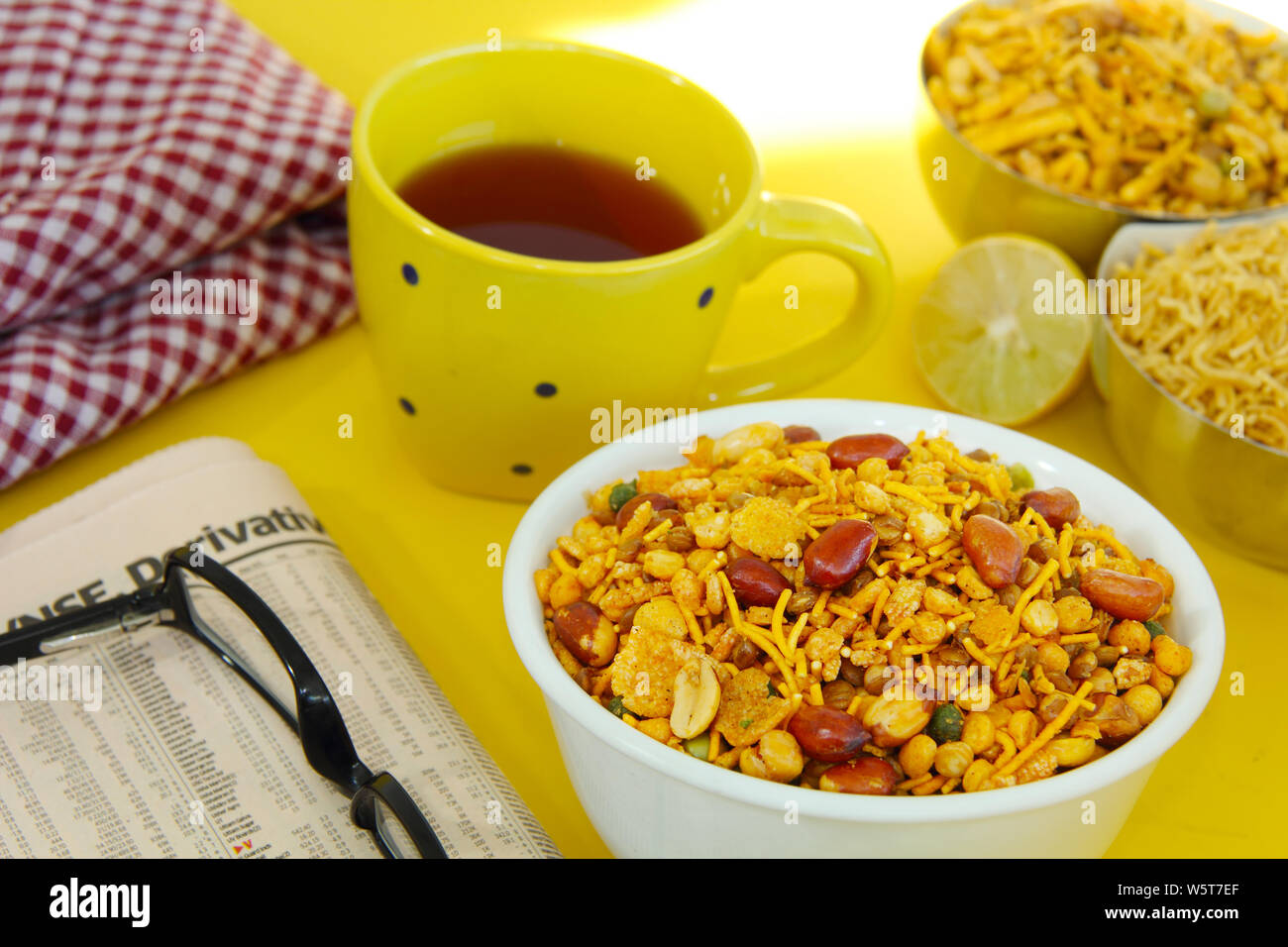 Traditional Indian assorted namkeen with lemon tea Stock Photo - Alamy