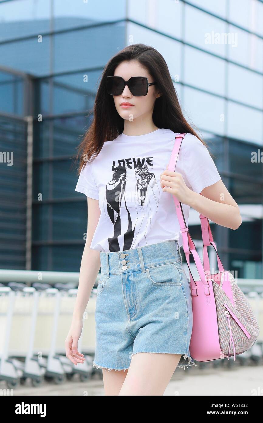 Chinese model He Sui arrives at the Shanghai Hongqiao International ...