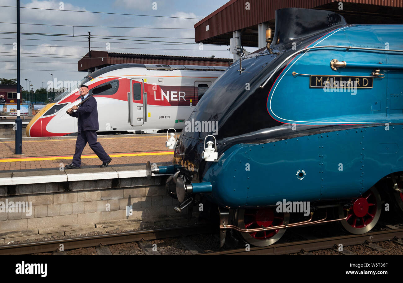 Steam traction inspector Jim Smith is pictured with a new Azuma train ...