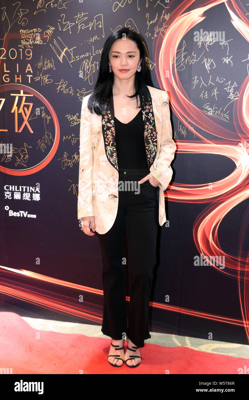 Chinese actress Yao Chen poses as she arrives on the red carpet for the Magnolia Gala Night in ...