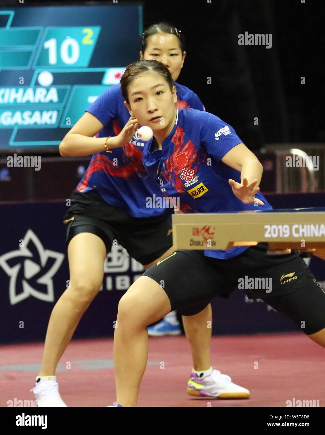 Gu Yuting and Liu Shiwen of China return a shot to Miyuu Kihara and ...