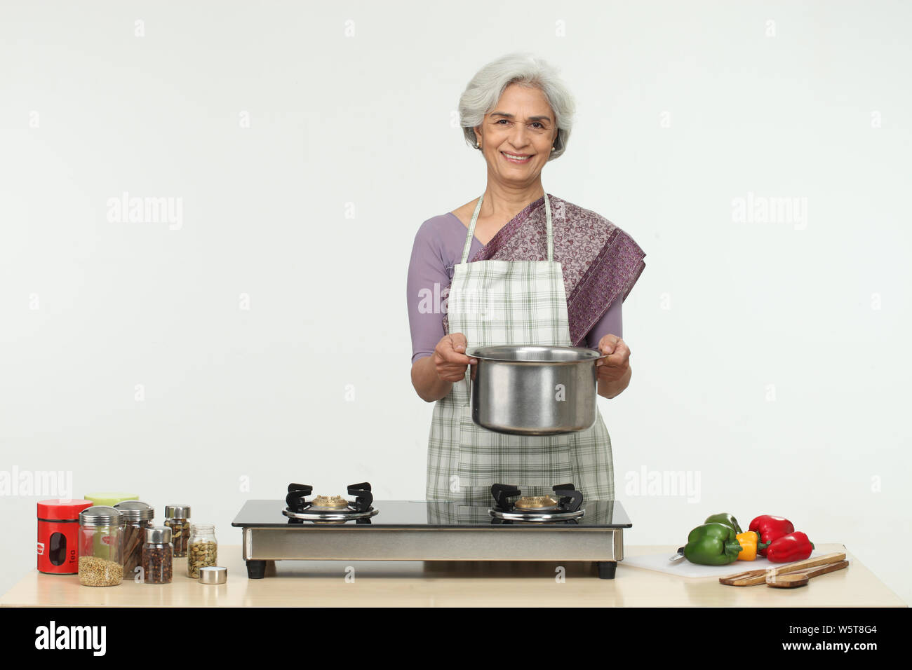 Indian old woman cooking food hi-res stock photography and images - Alamy