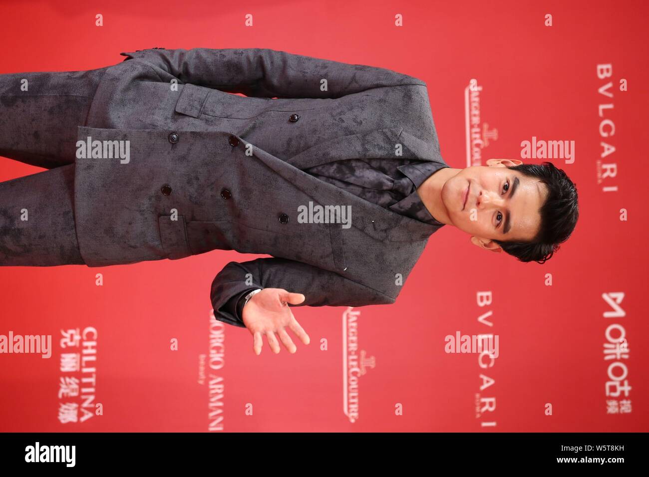 Taiwanese actor Eddie Peng arrives on the red carpet for the opening ...