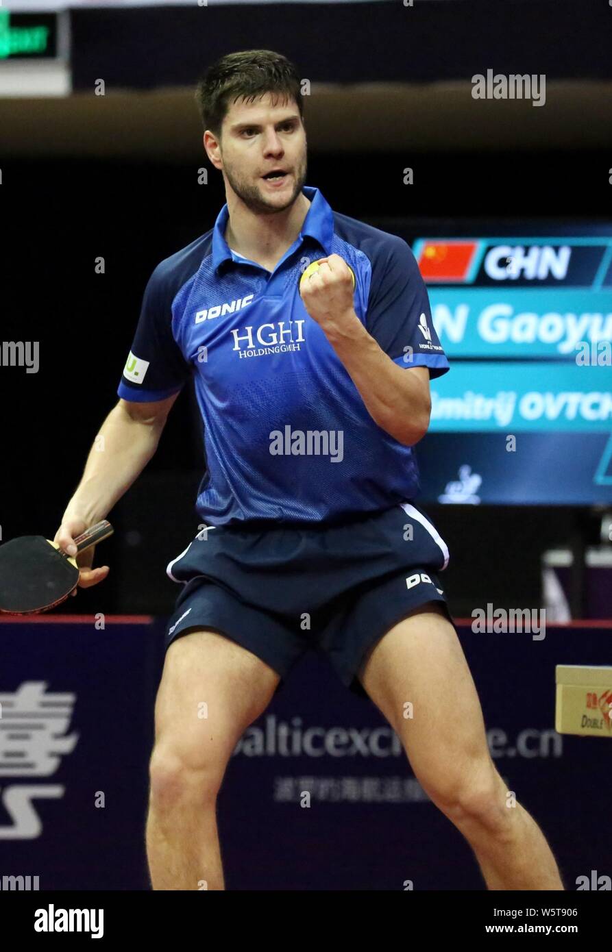 Dimitrij Ovtcharov of Germany celebrates after scoring against Lin ...