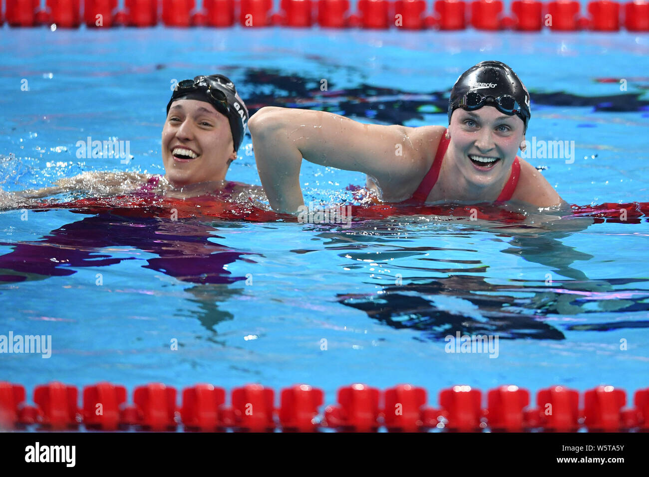 Annie Lazor of the USA, right, celebrates after winning the Women's ...