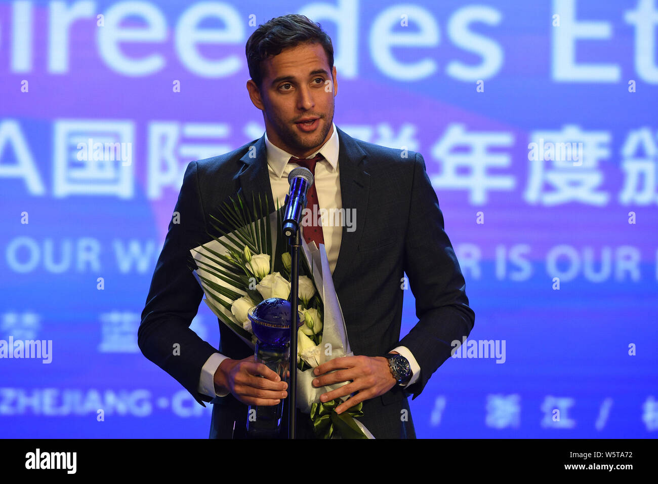 South African swimmer Chad le Clos poses with his trophy after winning ...