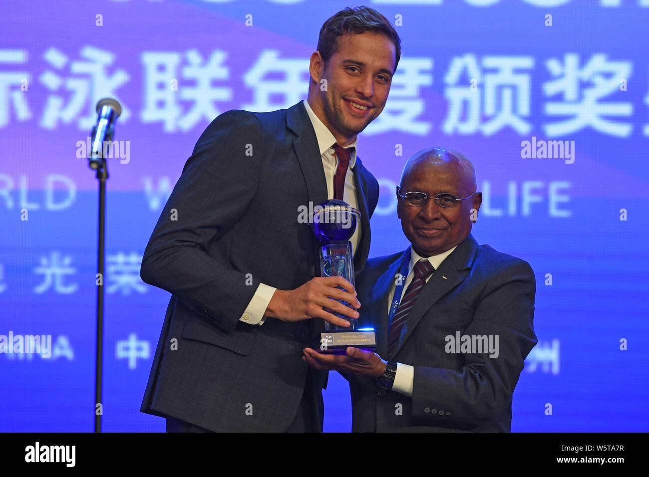 South African swimmer Chad le Clos poses with his trophy after winning ...