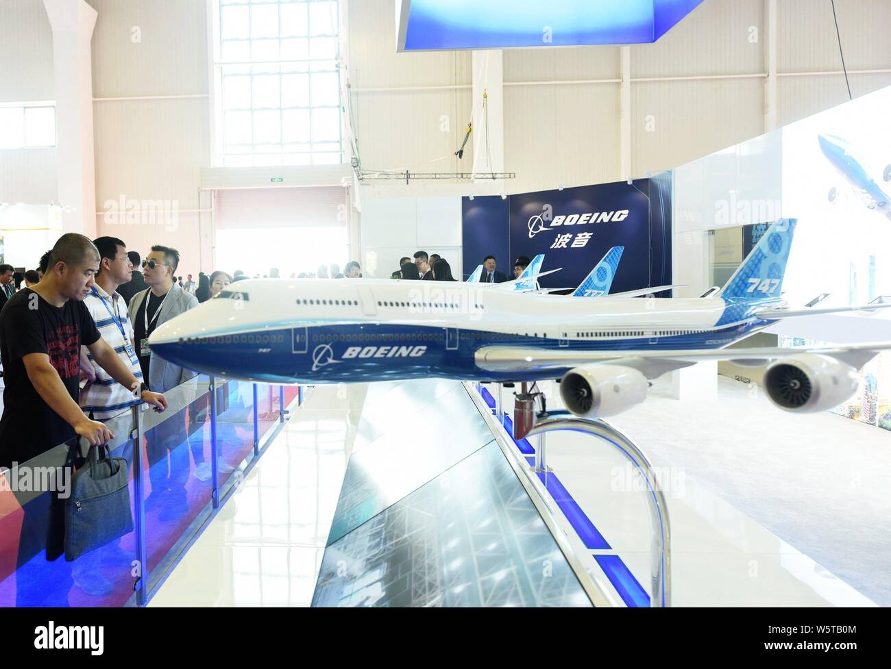 --FILE--A model plane is on display at the stand of Boeing during the ...