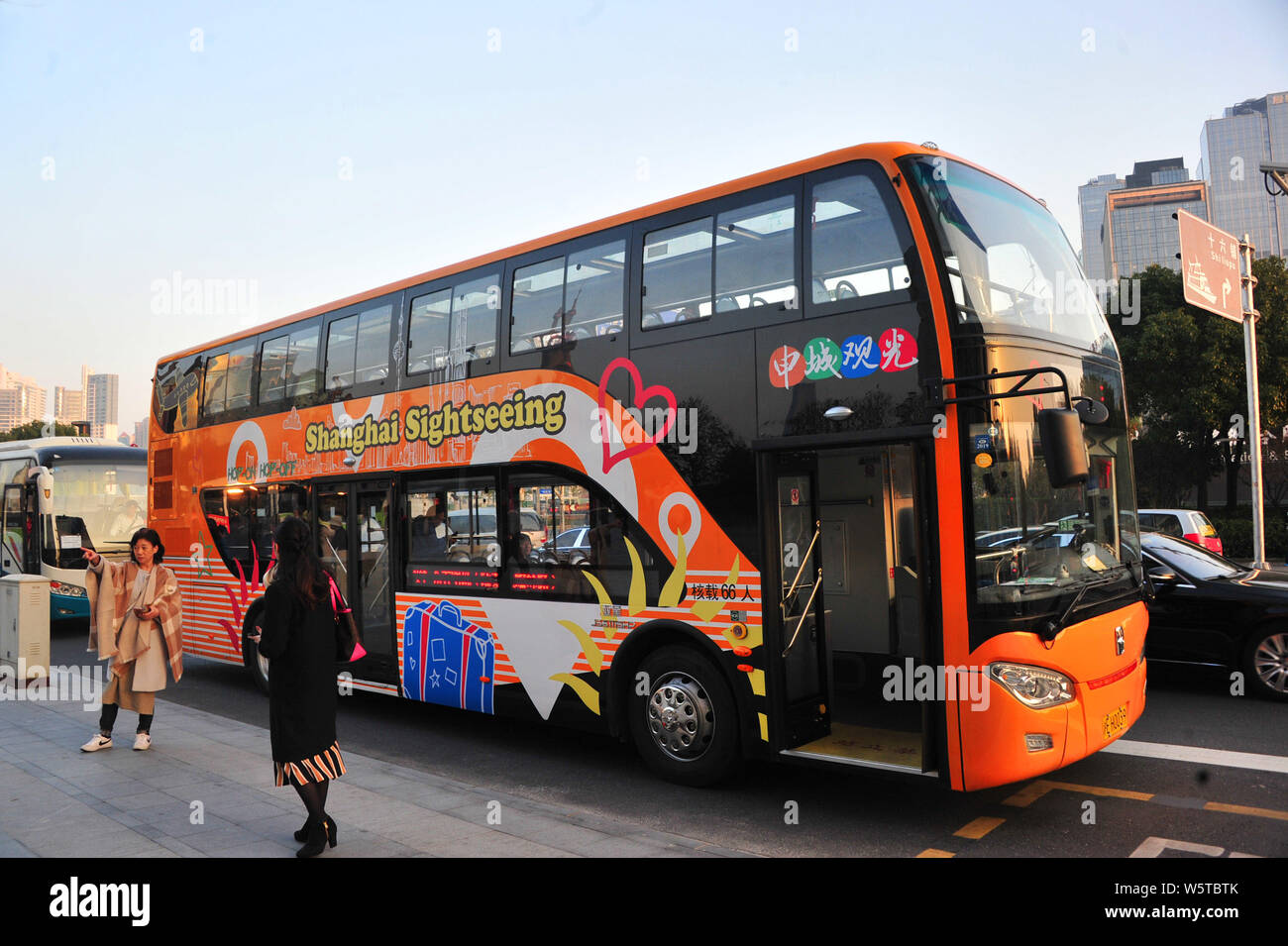 An artificial intelligence double-decker sightseeing bus developed by ...