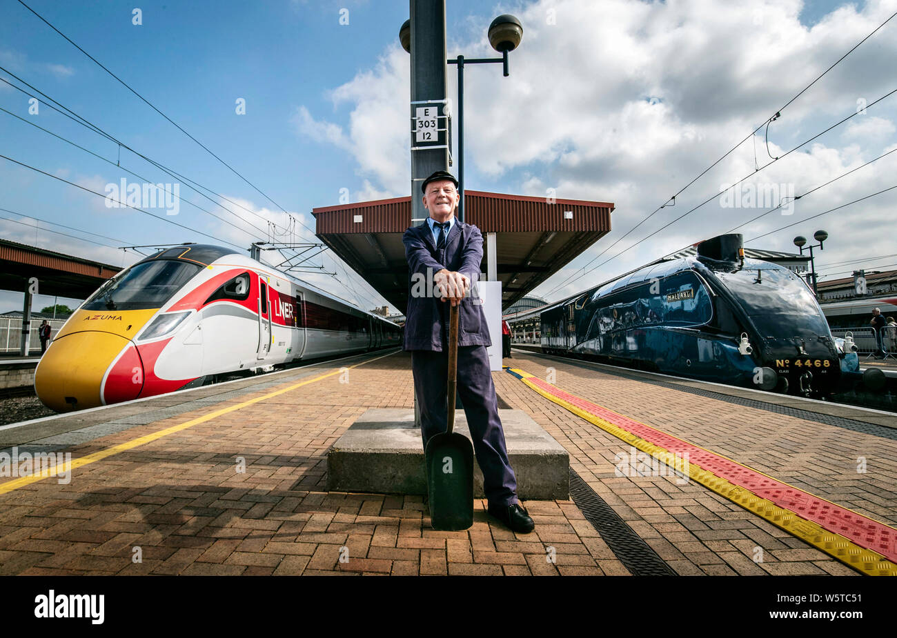 Steam traction inspector Jim Smith is pictured with a new Azuma train ...