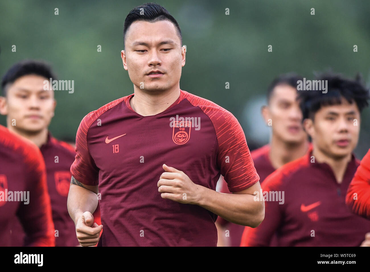 Gao Lin, front, and teammates of the Chinese national men's football ...