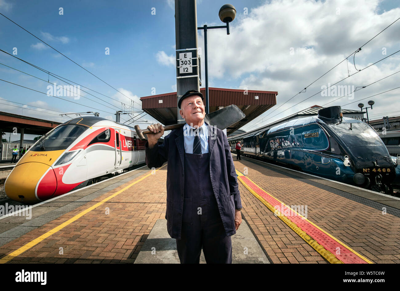 Steam traction inspector Jim Smith is pictured with a new Azuma train ...