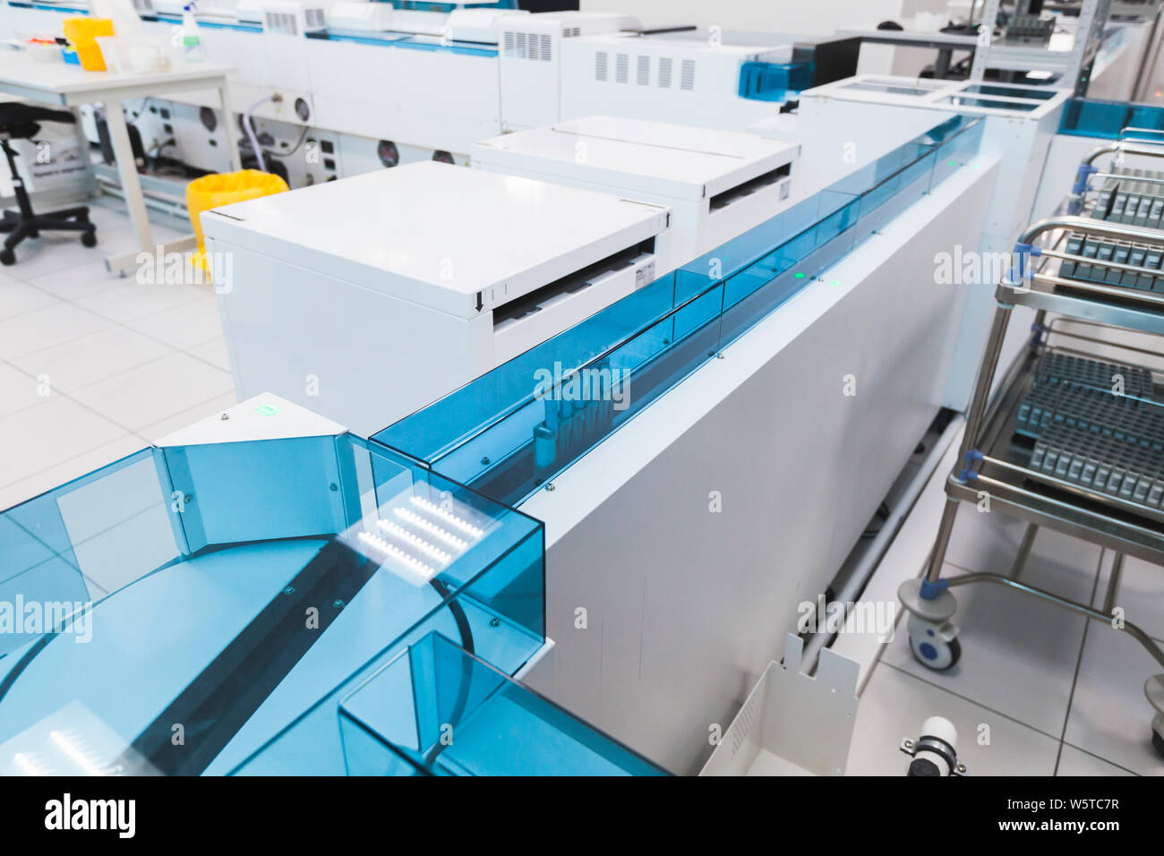 Blood samples move on the tray of pre-analytical system in clinical ...