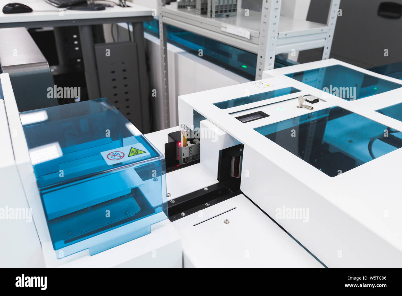 Blood samples move on the tray of pre-analytical system with bar code ...