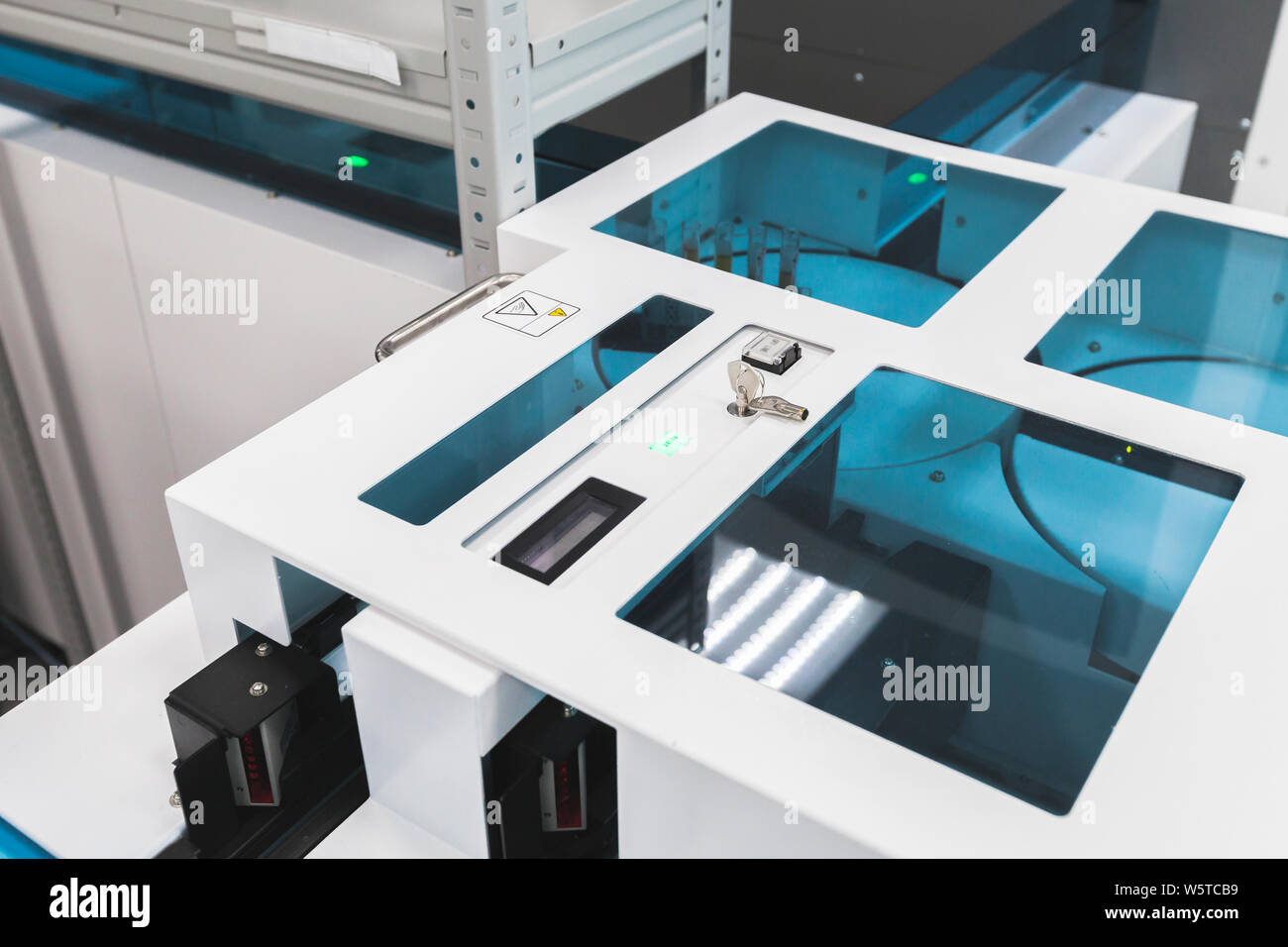Blood samples bar code scanner on the tray of pre-analytical system ...