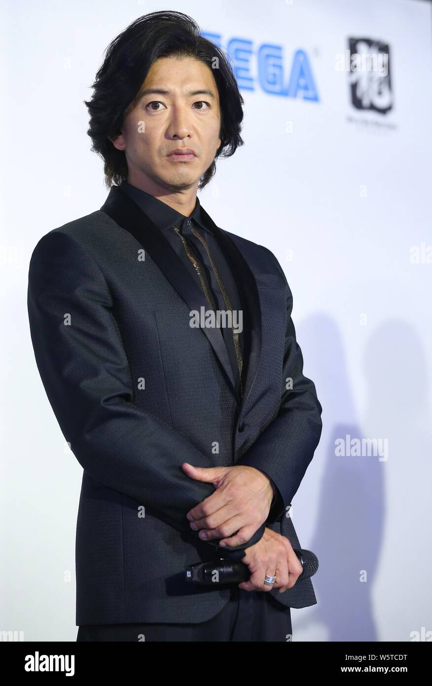 **TAIWAN OUT**Japanese actor and singer Takuya Kimura attends a promotional event for the video ...