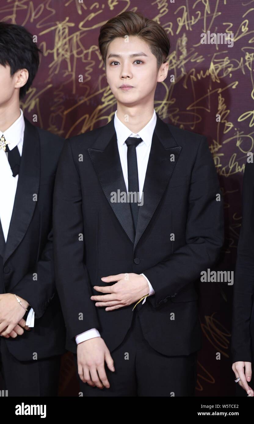 Chinese actor and singer Lu Han poses as he arrives on the red carpet ...