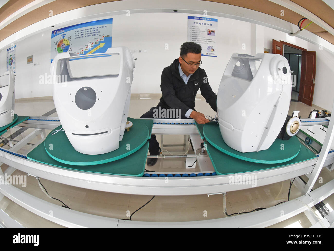 Service robots hi-res stock photography and images - Alamy