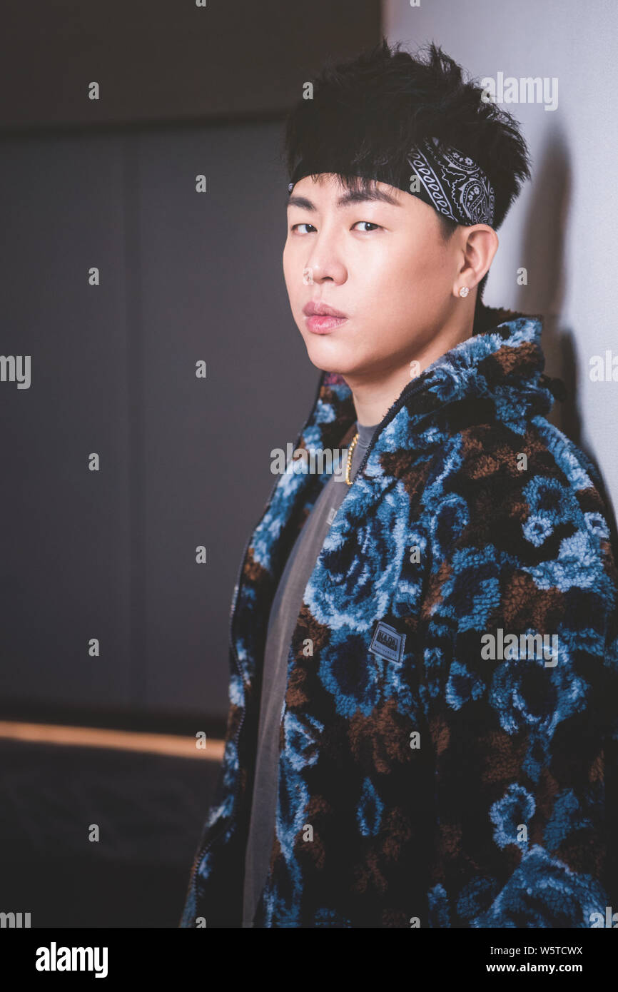 Chinese pop singer and singer-songwriter Tiger Hu Yanbin poses for ...