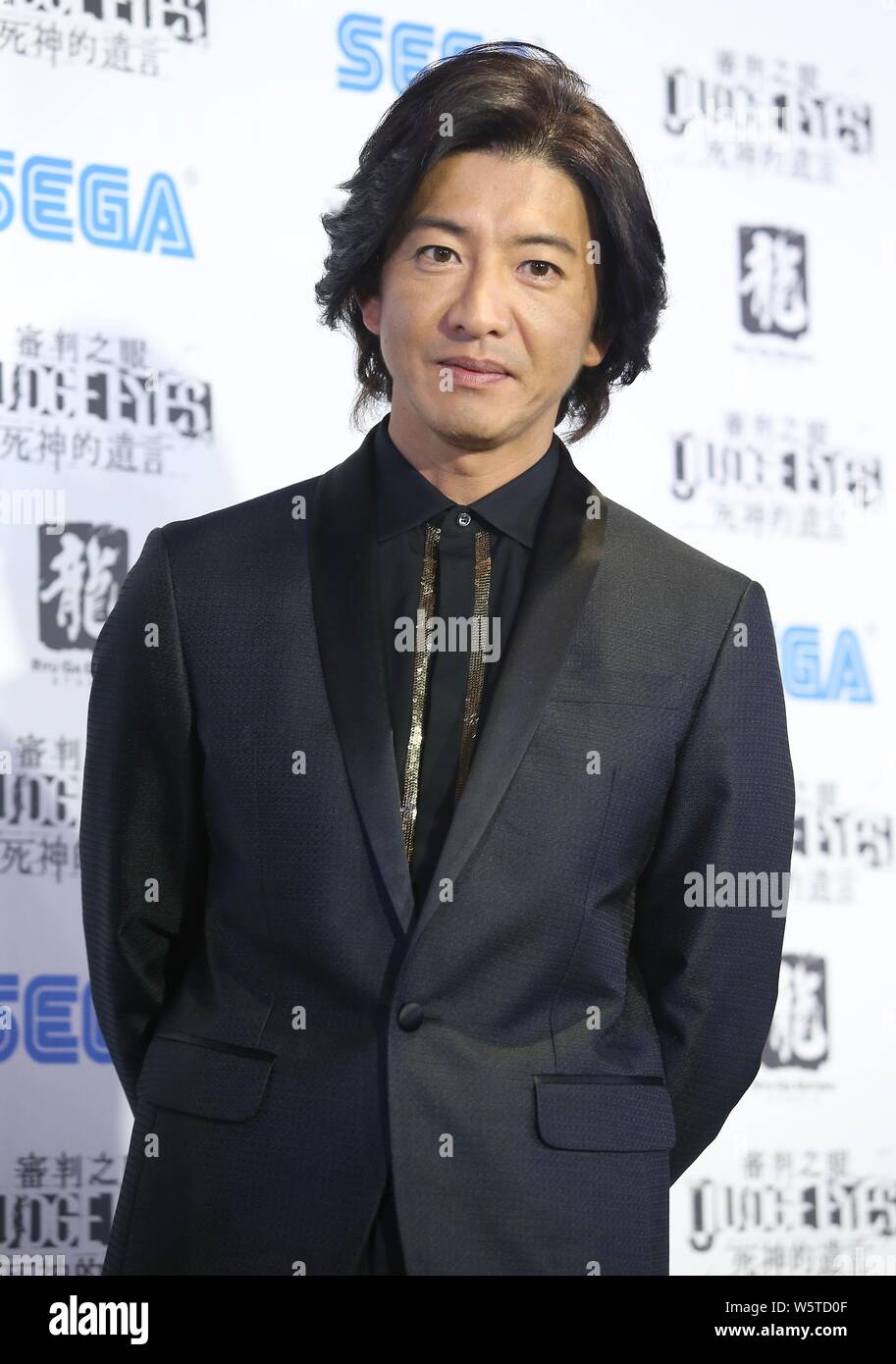 **TAIWAN OUT**Japanese actor and singer Takuya Kimura attends a ...