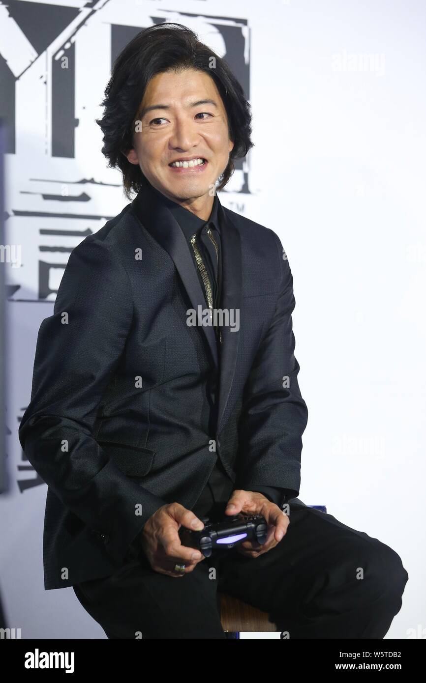 **TAIWAN OUT**Japanese actor and singer Takuya Kimura attends a ...